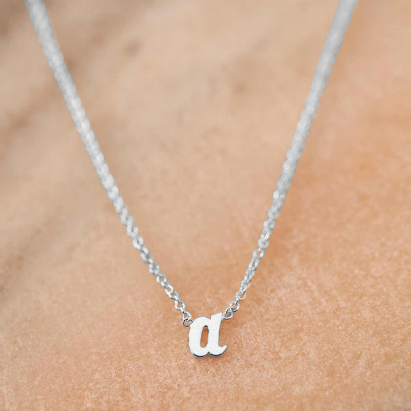 Lowercase initial necklace silver store